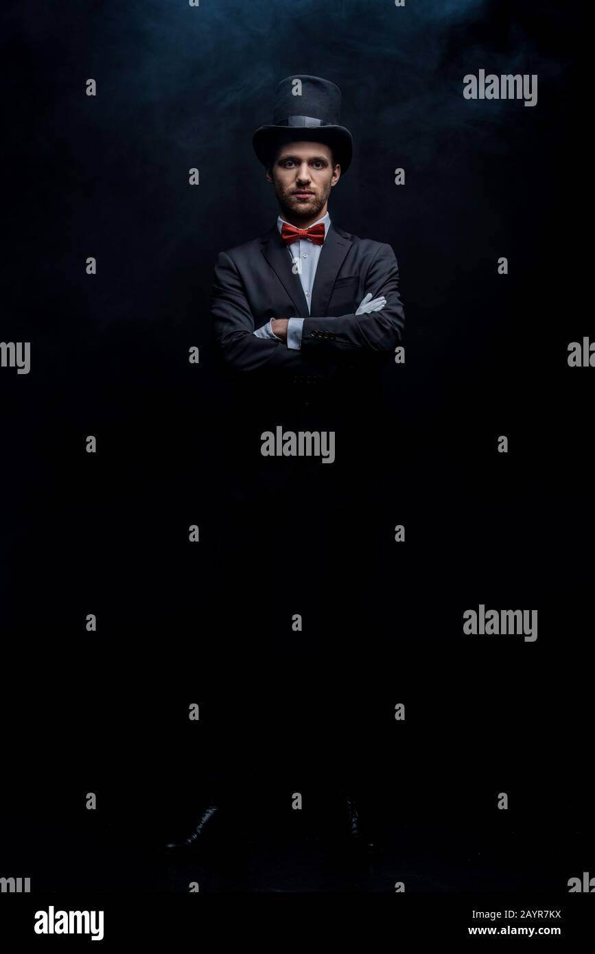 Professional magician in dark suit hi-res stock photography and images ...