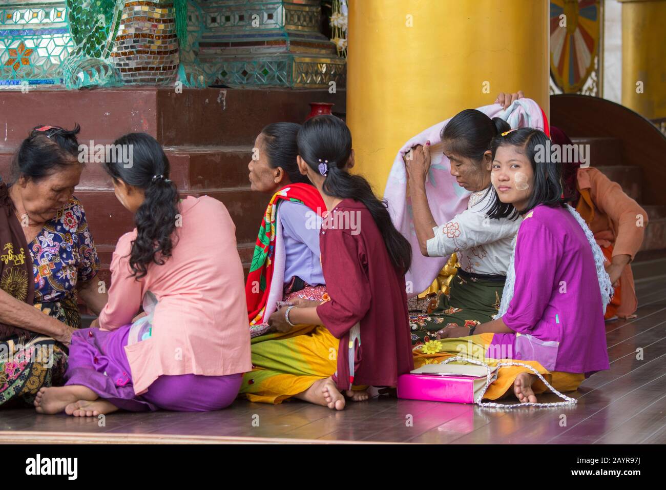 People worshipping at the 2,500 years old Shwedagon Pagoda in Yangon ...