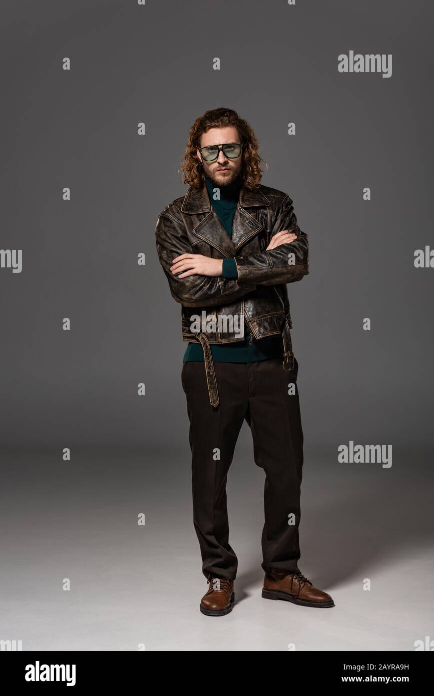 Man in leather jacket, arms crossed hi-res stock photography and images ...