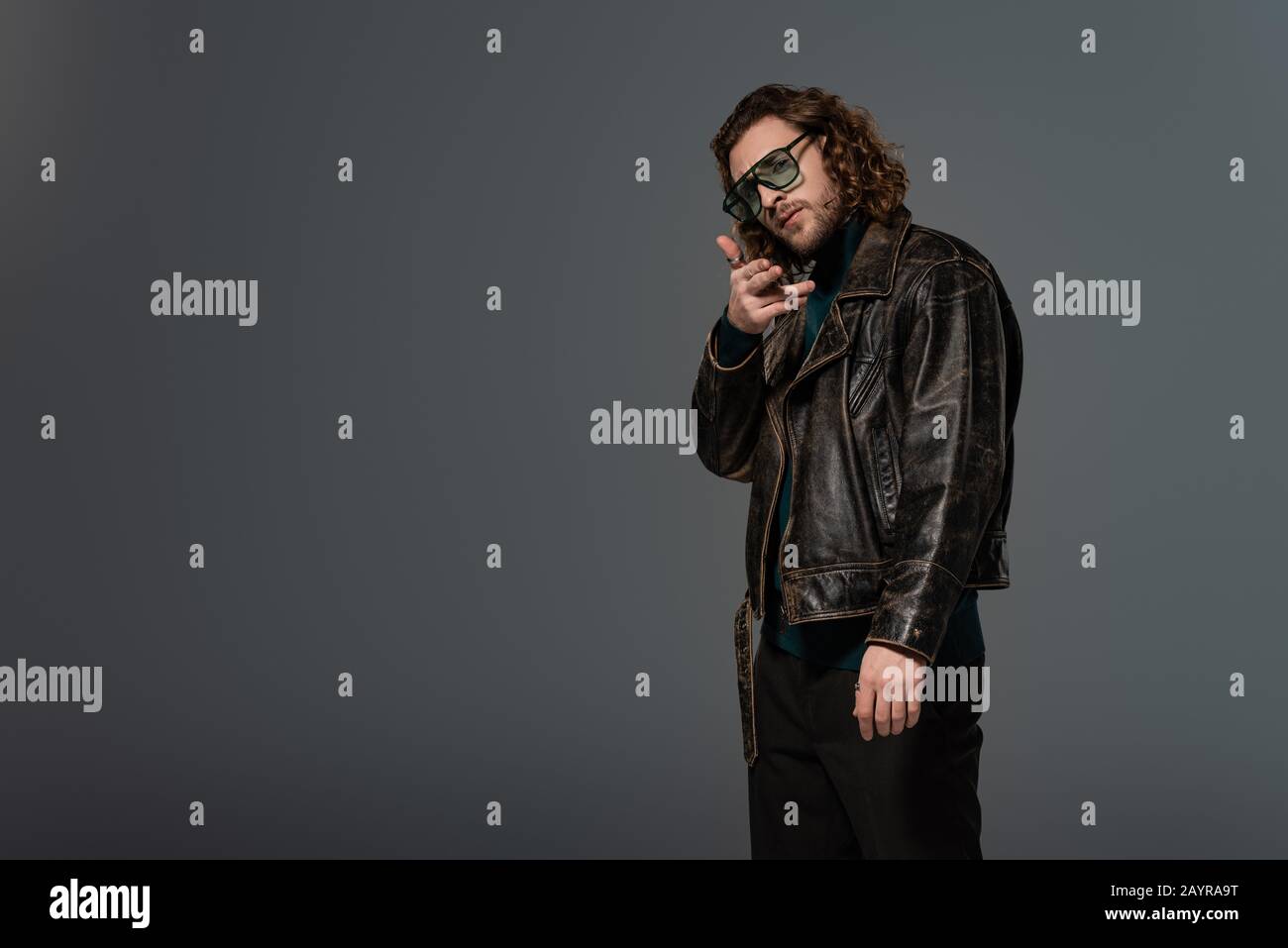 Man with gun leather jacket hi-res stock photography and images - Alamy