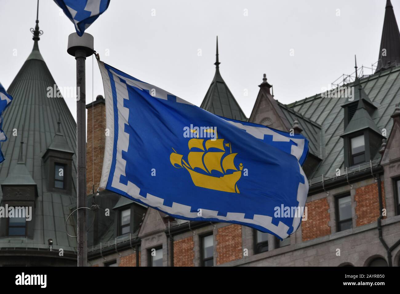 The flag of Quebec City flying over the Ville de Quebec. Canada Stock ...