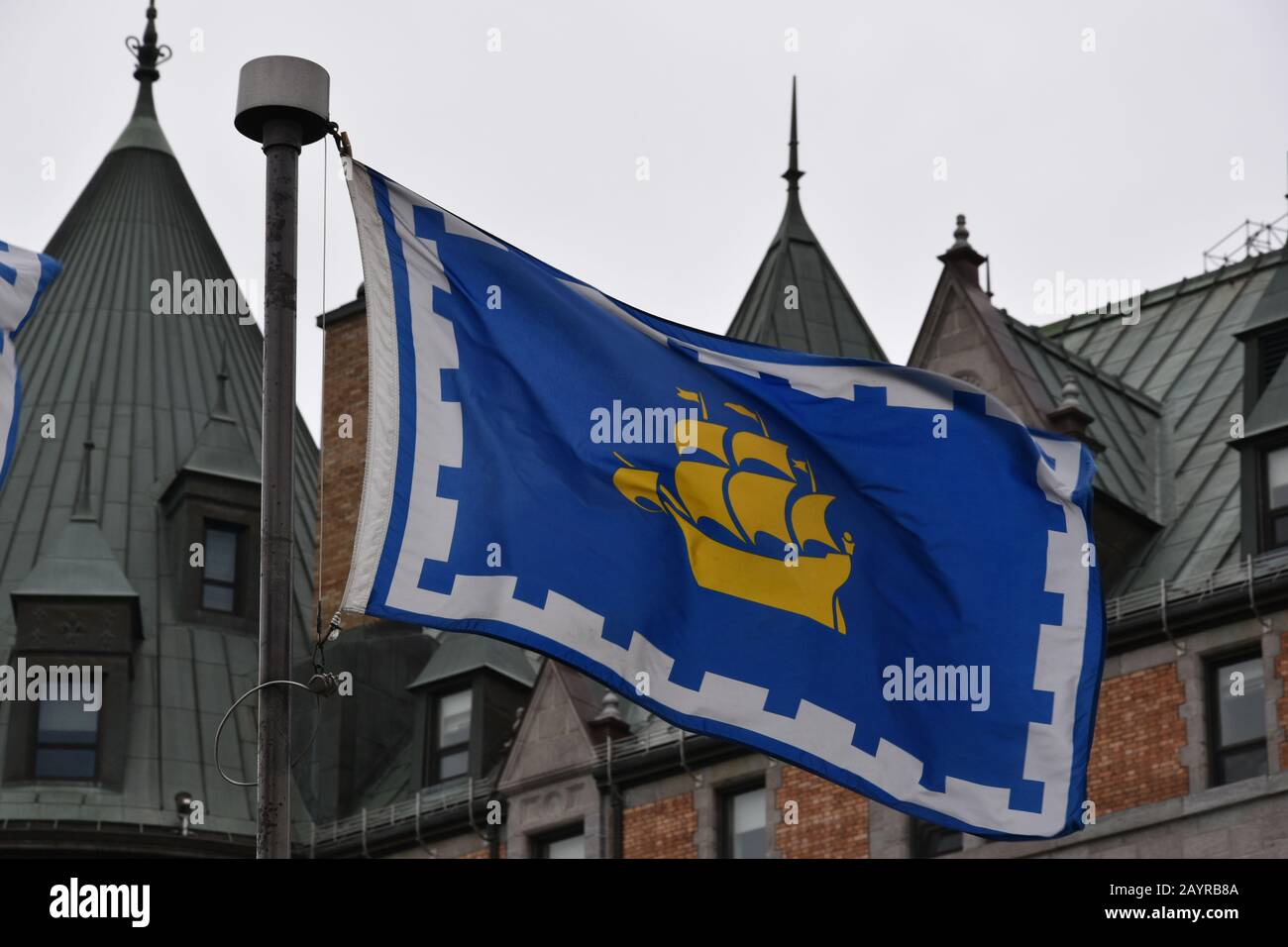 The flag of Quebec City flying over the Ville de Quebec. Canada Stock ...