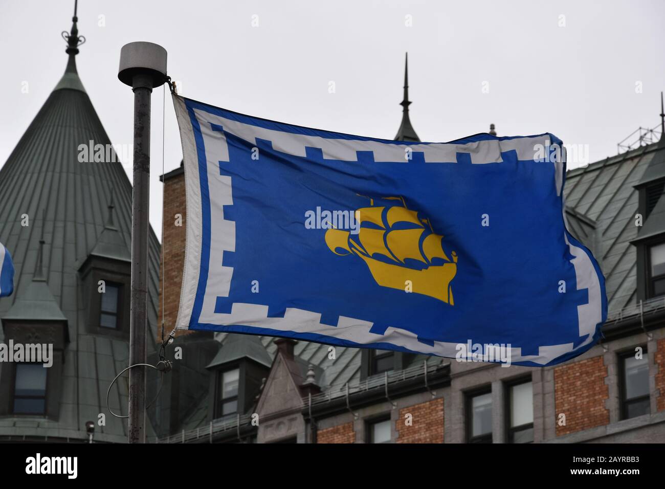 The flag of Quebec City flying over the Ville de Quebec. Canada Stock ...
