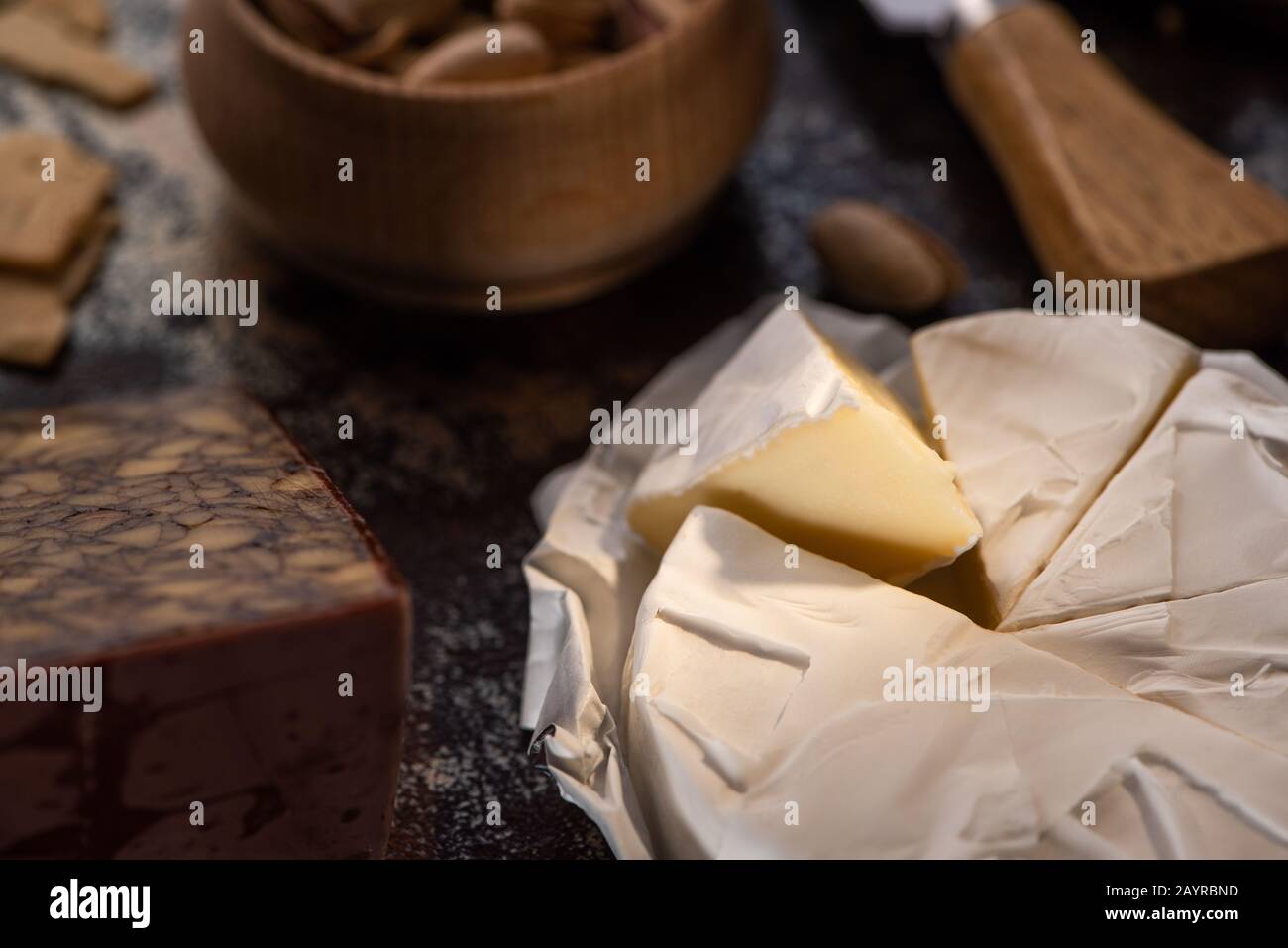 Cut brie cheese hi-res stock photography and images - Alamy