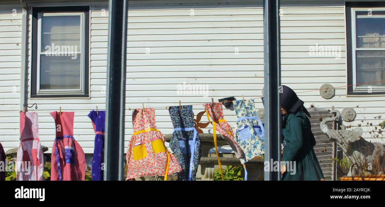 Amish Woman Tending to Roadside Laundry Stock Photo - Alamy