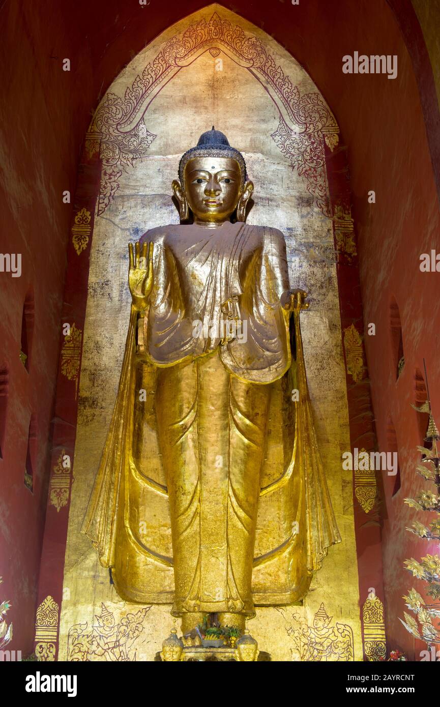 One of the four Buddha statues inside the Ananda Temple, which is a ...