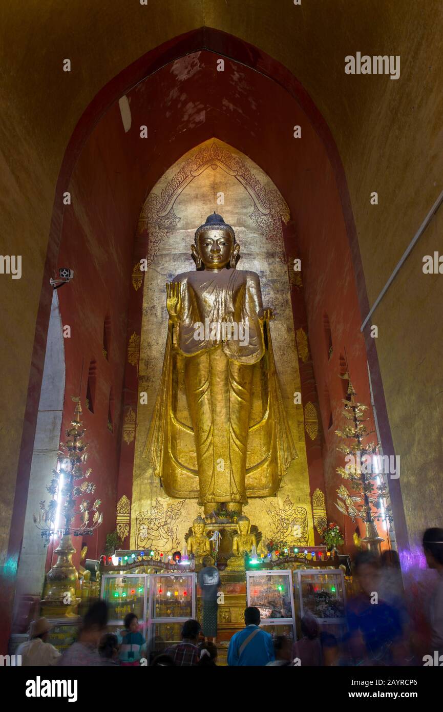 One of the four Buddha statues inside the Ananda Temple, which is a ...