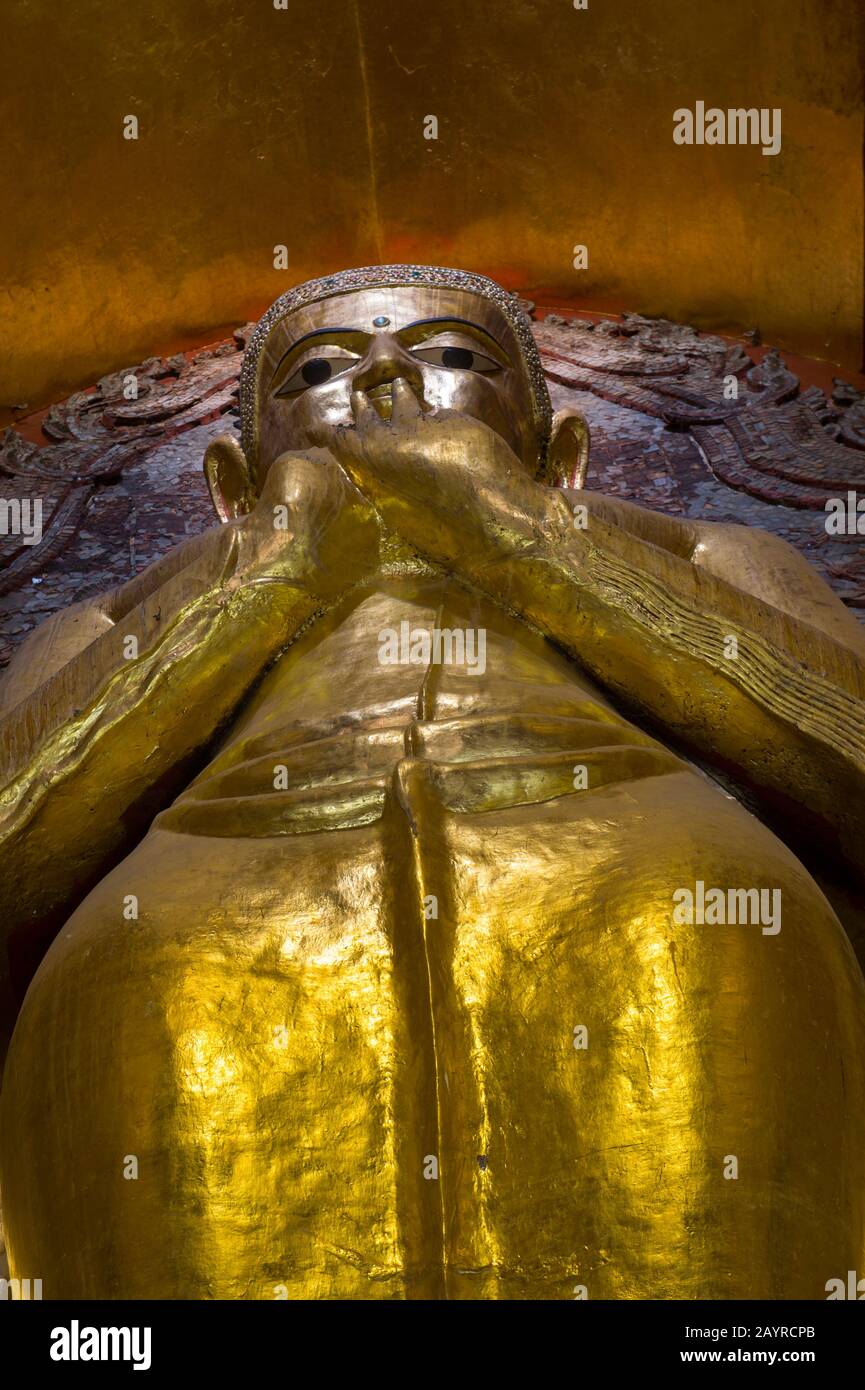 One of the four Buddha statues inside the Ananda Temple, which is a ...