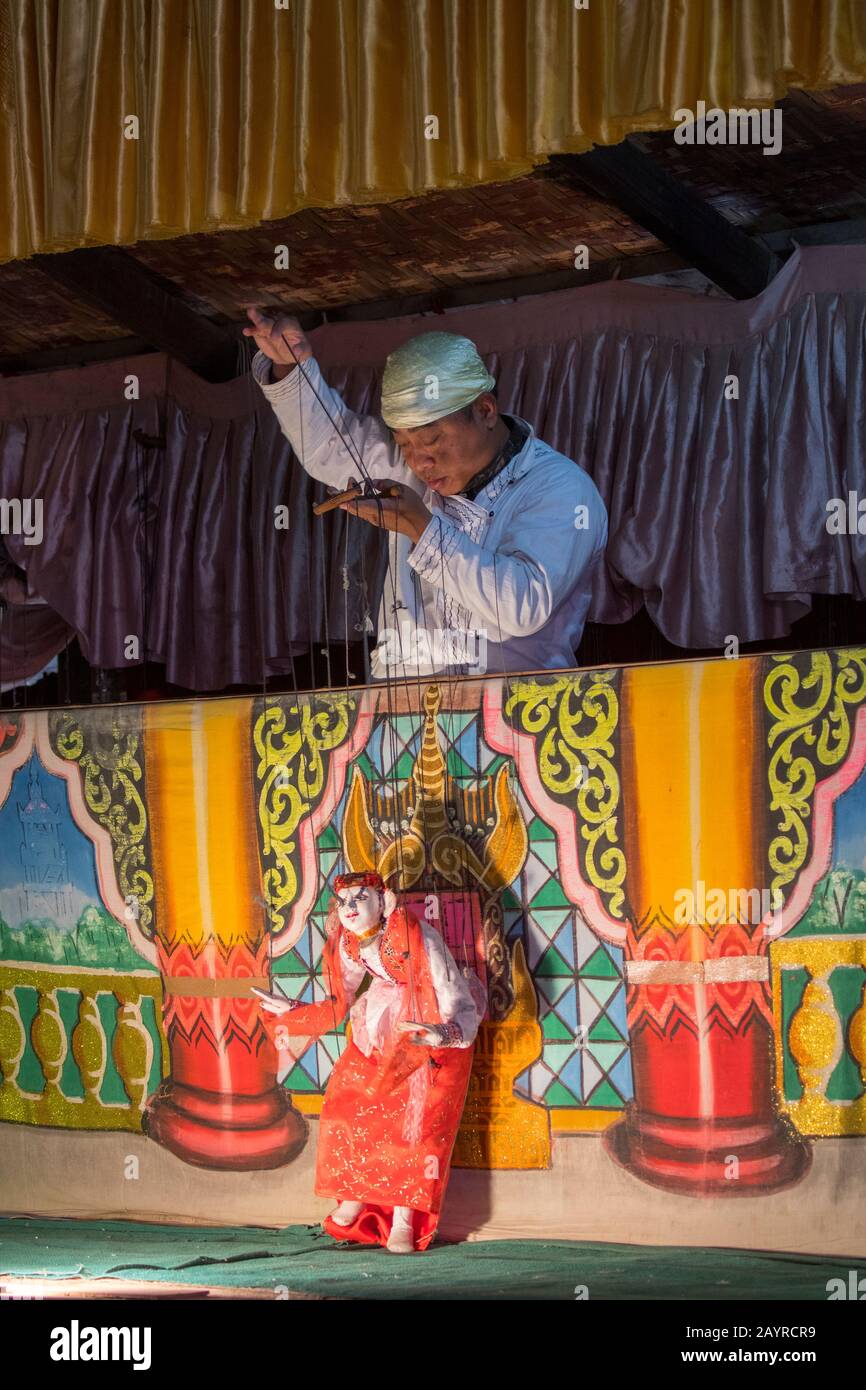 A puppeteer is performing a traditional puppet show in Bagan, Myanmar ...