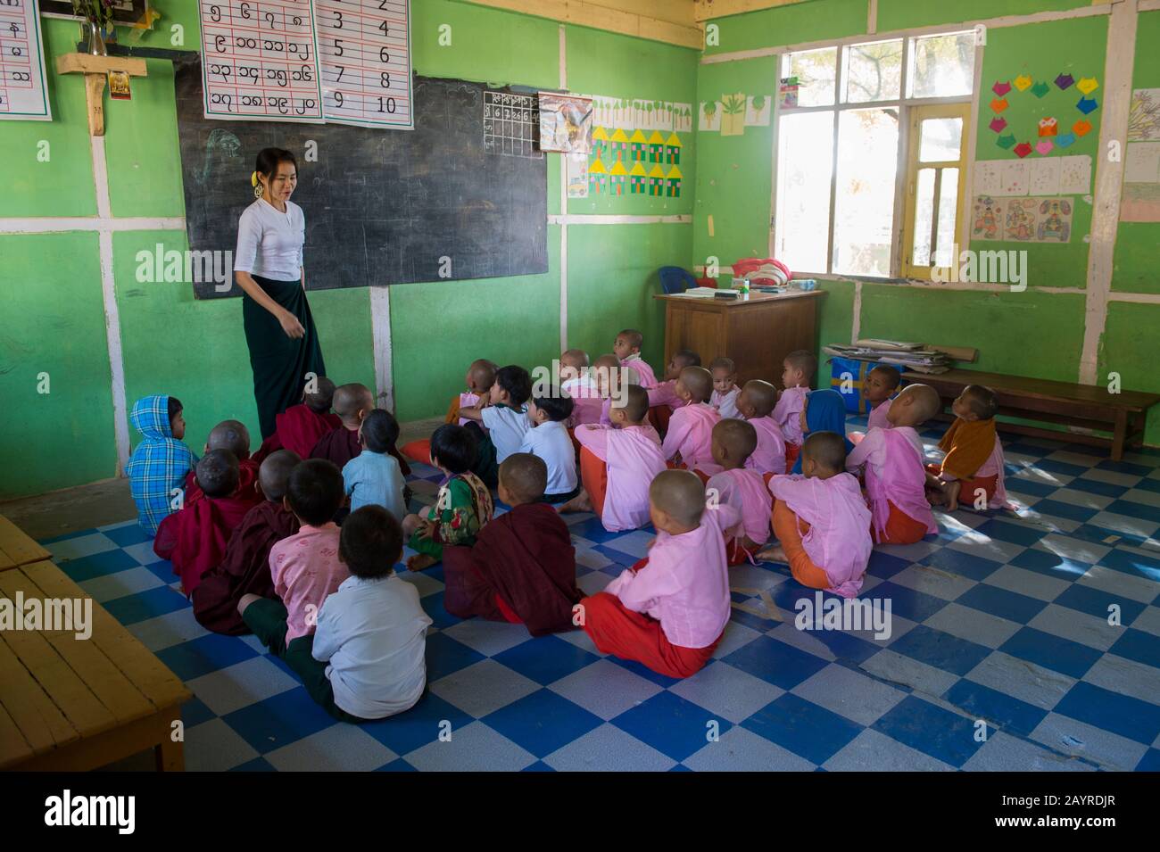 Elementary students in a classroom at the public school of the ...