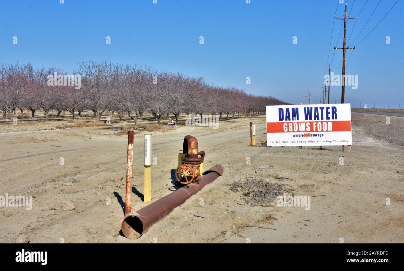 Sign about building dams for water for growing real food for the people ...