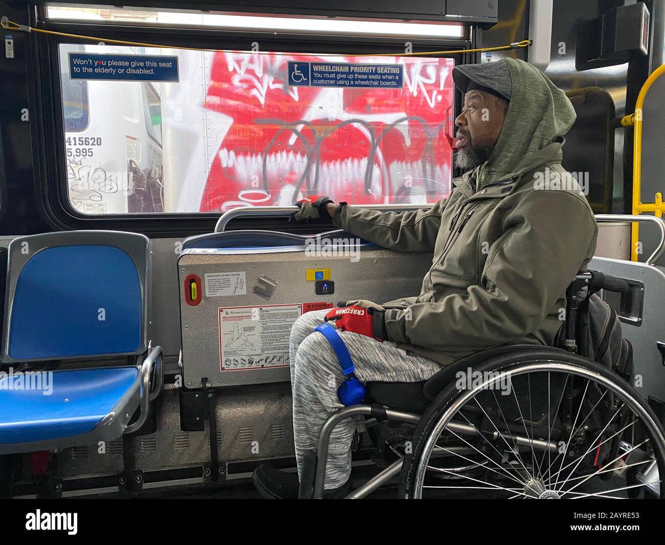 New York City bus with special seating area for people in wheelchairs ...