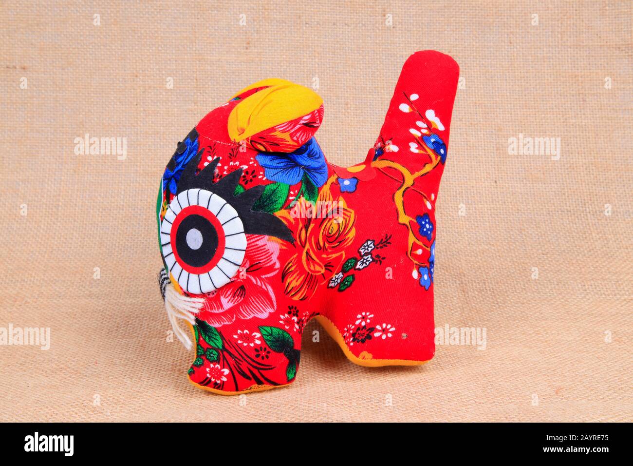traditional hand made cloth tiger toy Stock Photo - Alamy