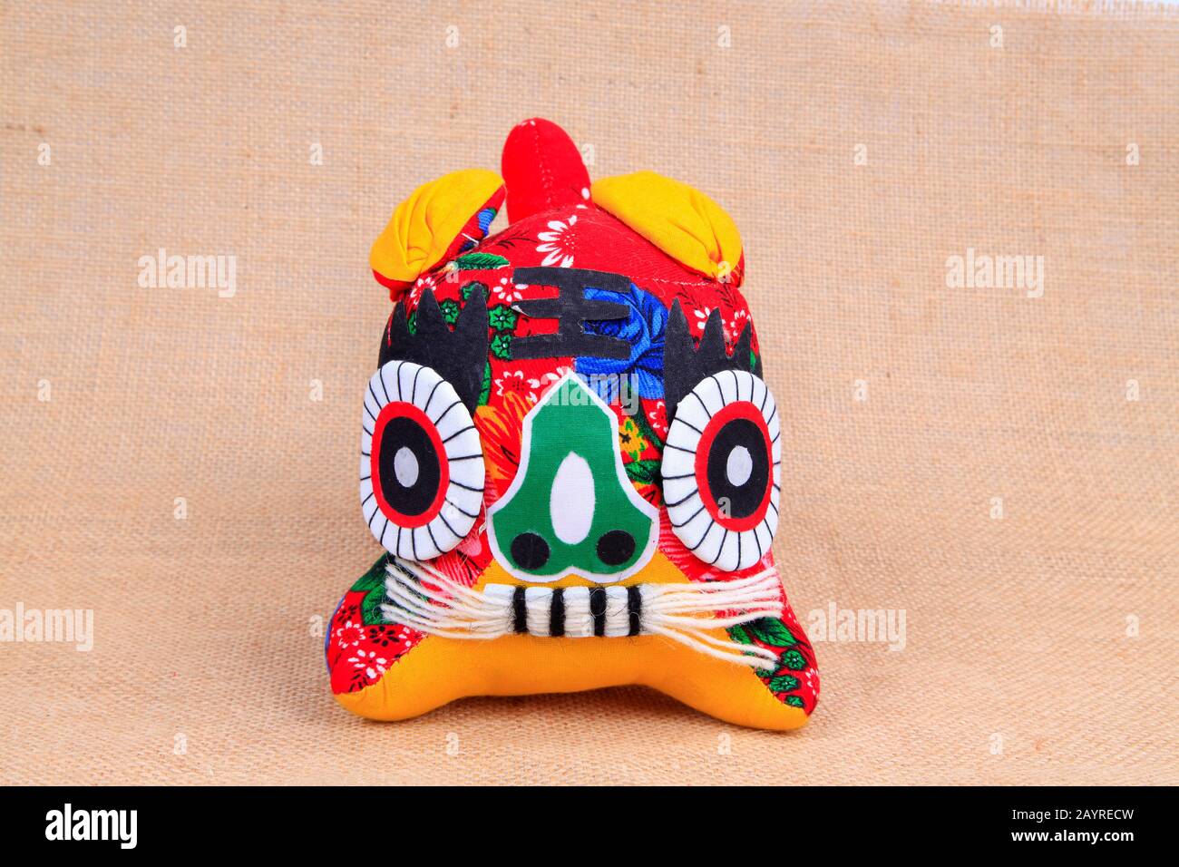 traditional hand made cloth tiger toy Stock Photo - Alamy
