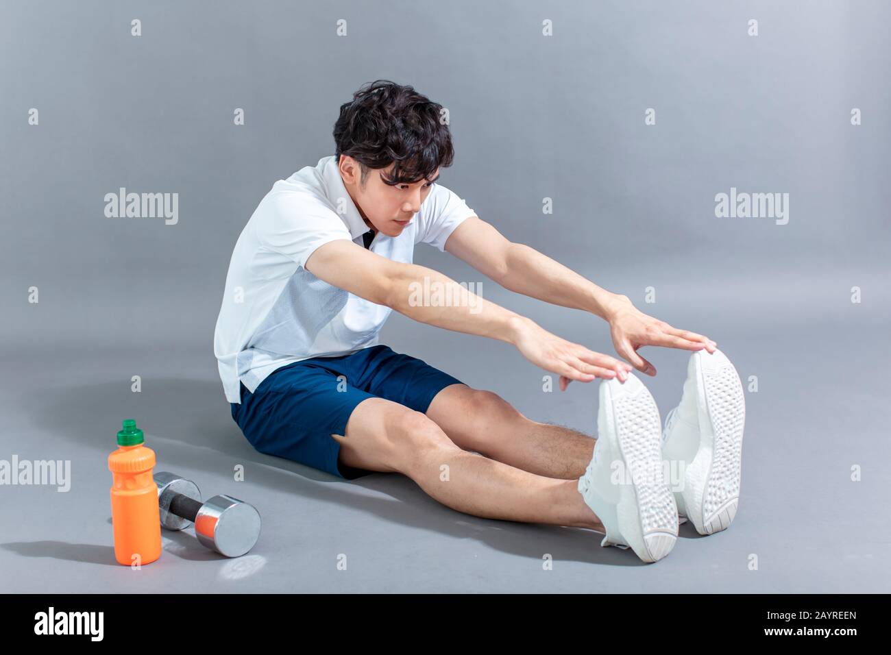 Male athlete out stretching hands hi-res stock photography and images ...