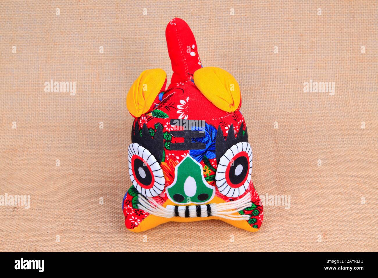 traditional hand made cloth tiger toy Stock Photo - Alamy