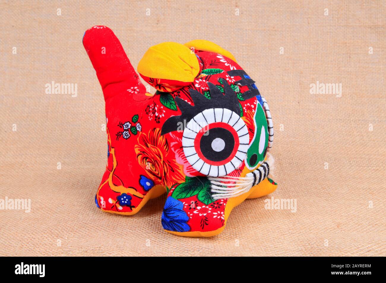 traditional hand made cloth tiger toy Stock Photo - Alamy
