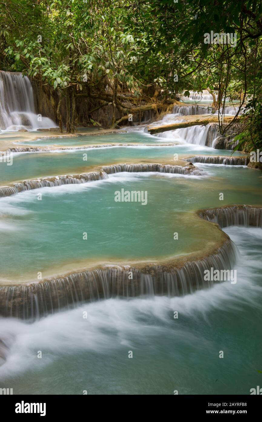 Cascades and turquoise blue pools of the Kuang Si Falls near Luang ...