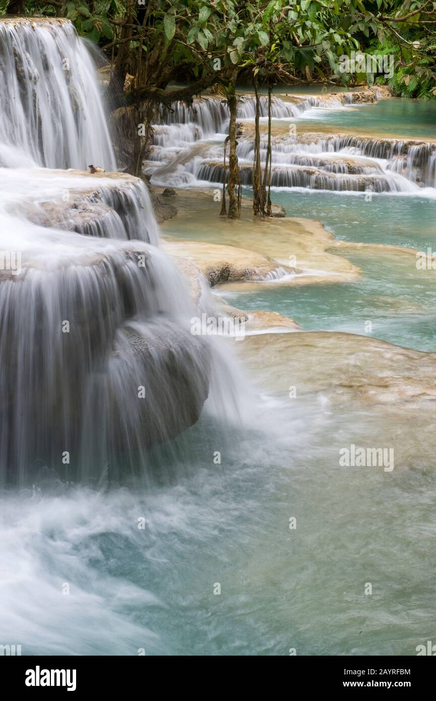 Cascades and turquoise blue pools of the Kuang Si Falls near Luang ...