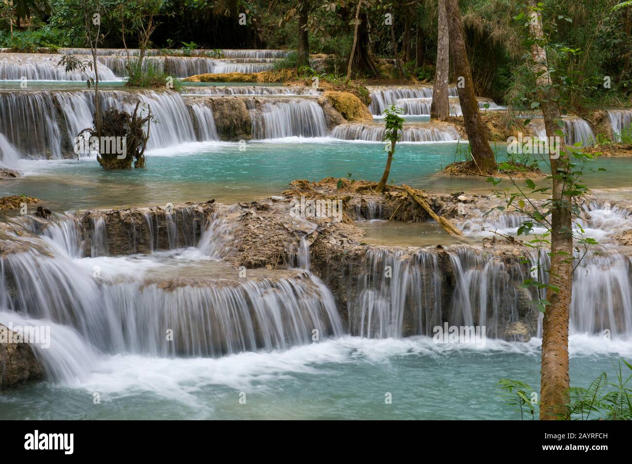 Cascades and turquoise blue pools of the Kuang Si Falls near Luang ...
