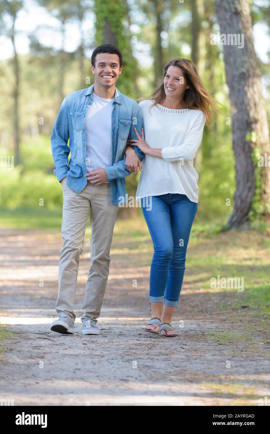couple walk forest love concept Stock Photo - Alamy