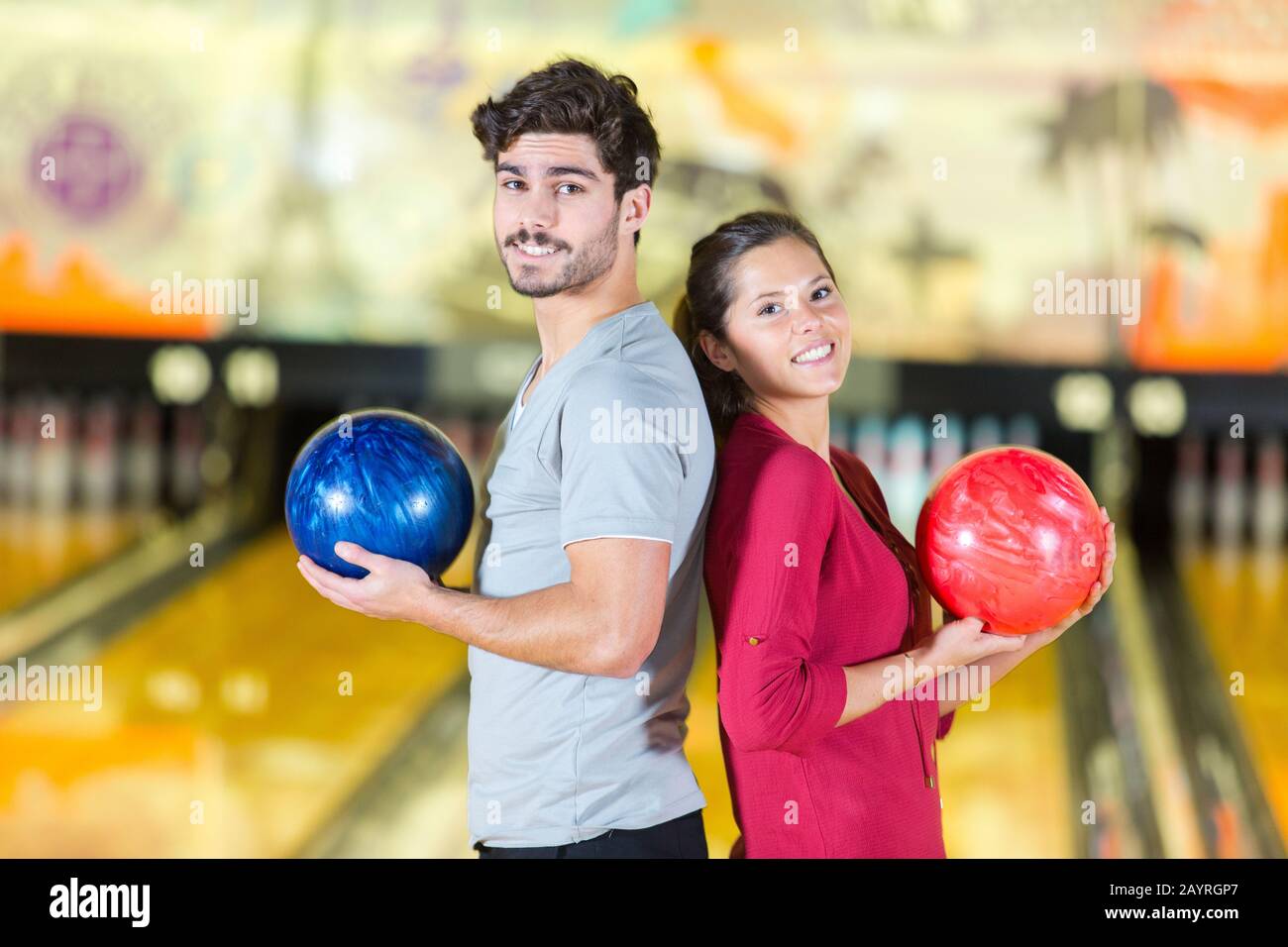 Couple bowling together hi-res stock photography and images - Alamy