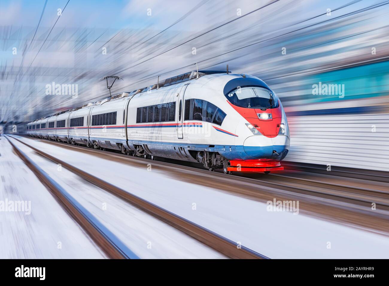 Highspeed train approaches to the station platform at day time Stock ...