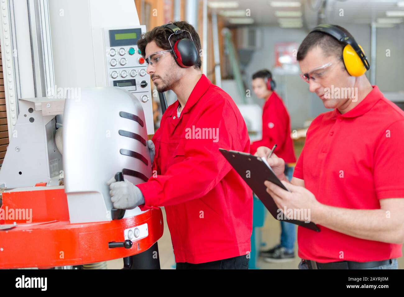 Man operating machines hi-res stock photography and images - Alamy