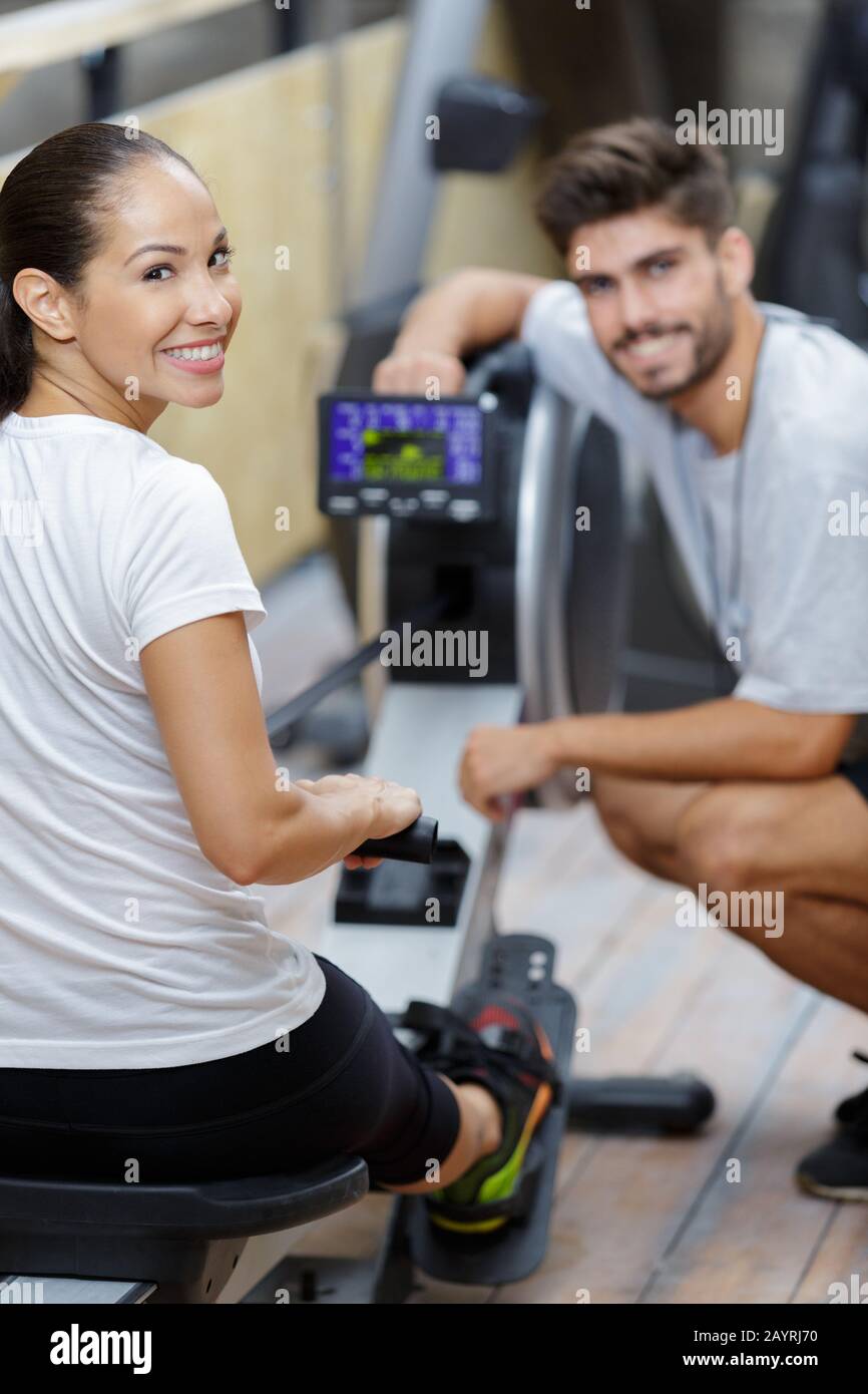 Woman sitting row machine hi-res stock photography and images - Alamy
