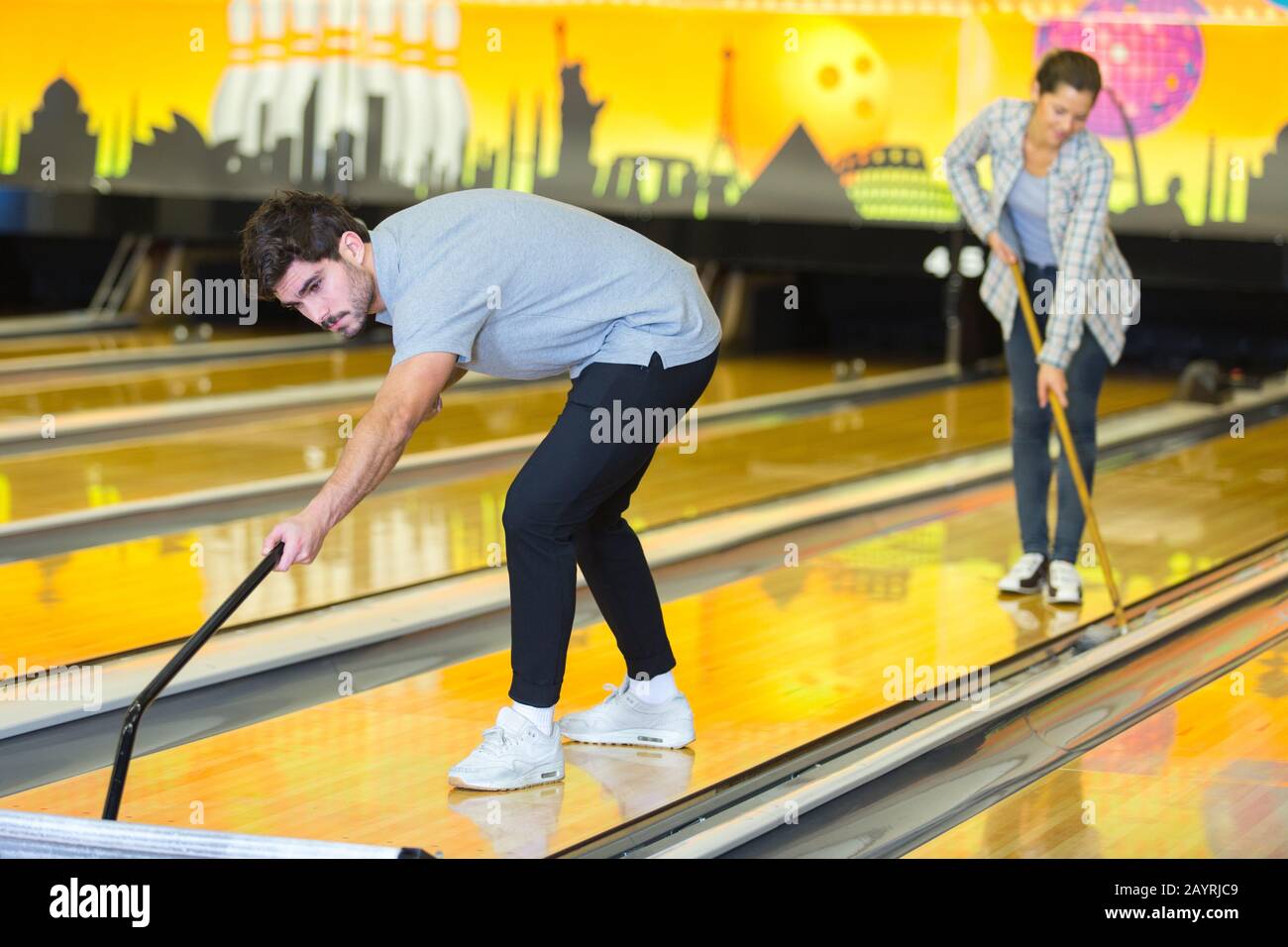 cleaning the bowling lanes Stock Photo - Alamy