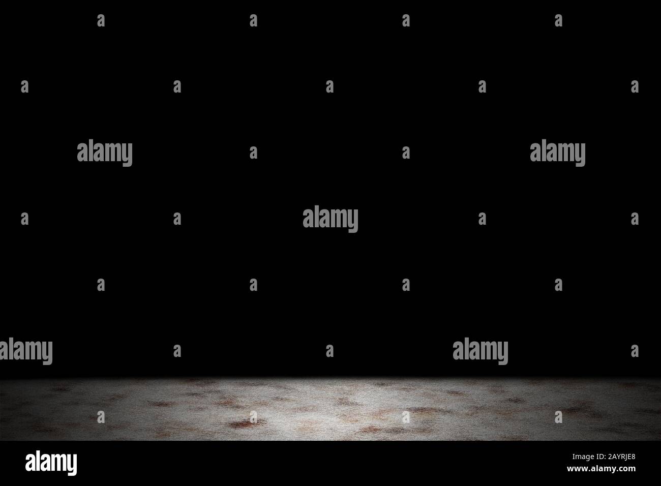 Light shining down on dirt concrete floor in dark room with copy space ...