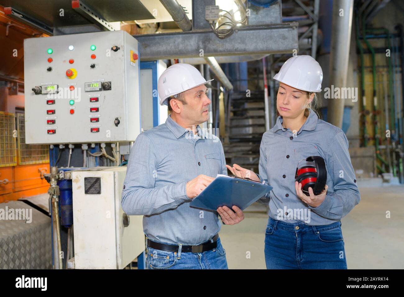 portrait of industrial engineers sharing information Stock Photo - Alamy
