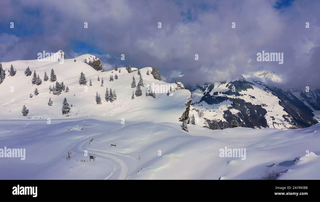 Fantastically beautiful snow landscape in the mountains - aerial flight ...
