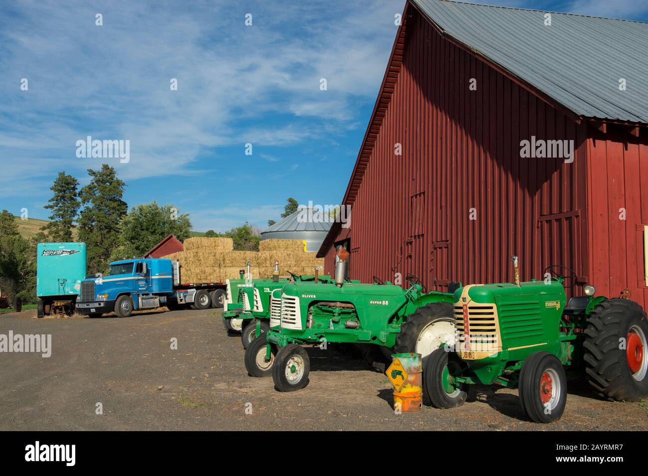 Old tractors in front of a barn in Whitman County in the Palouse ...