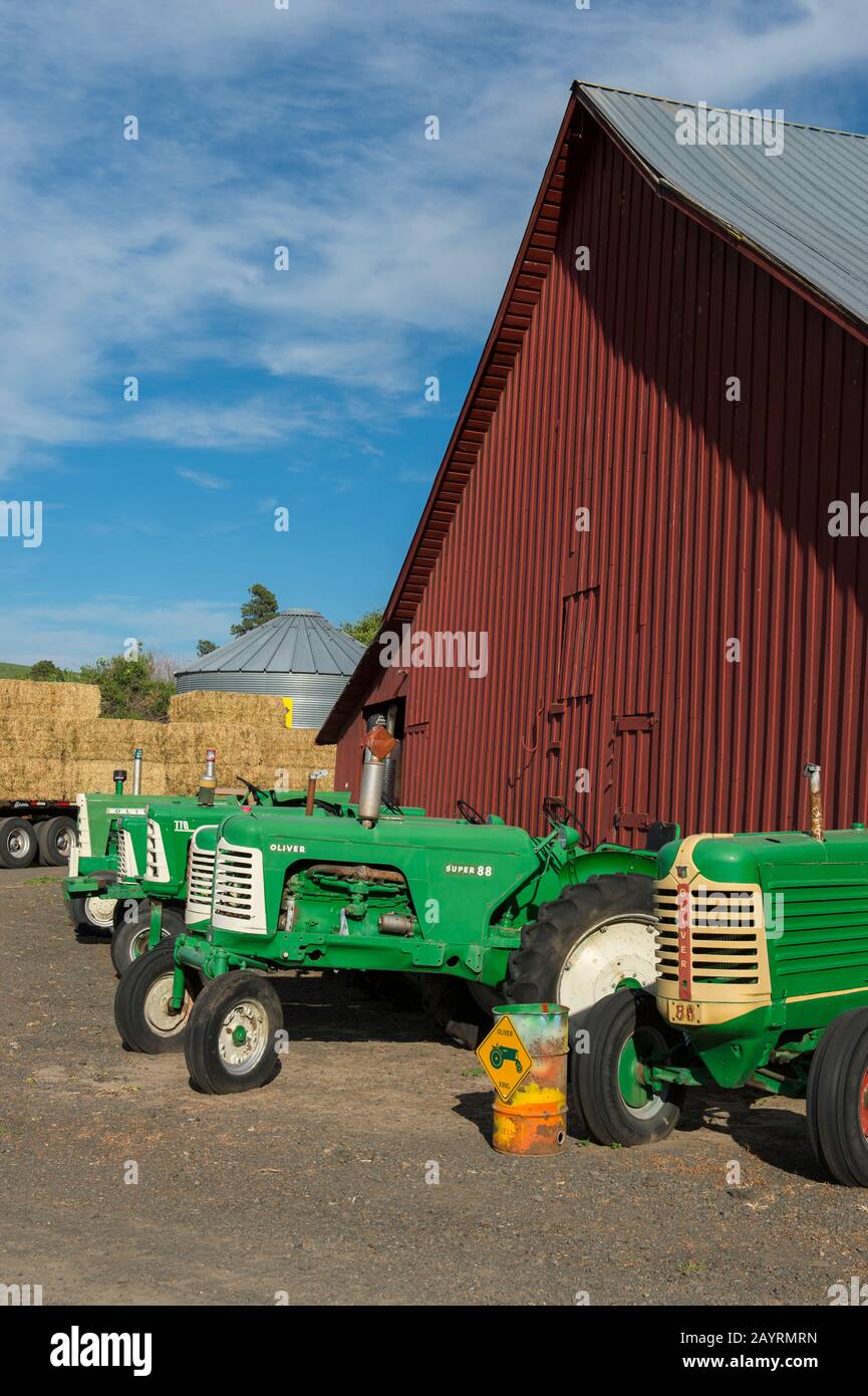 Old tractors in front of a barn in Whitman County in the Palouse ...