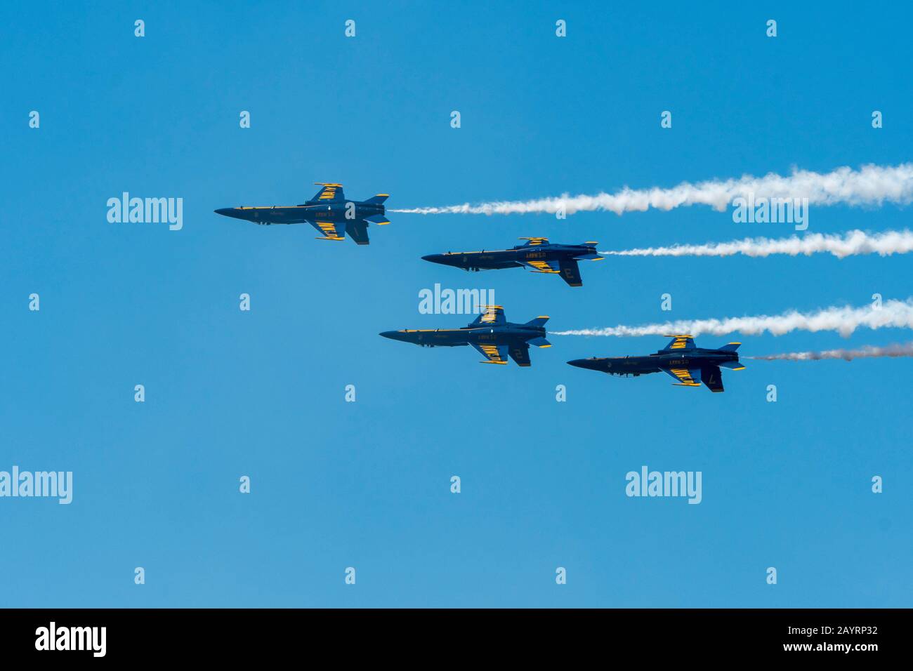 Blue Angels F/A-18 Hornets are flying The Diamond Roll (four planes in ...
