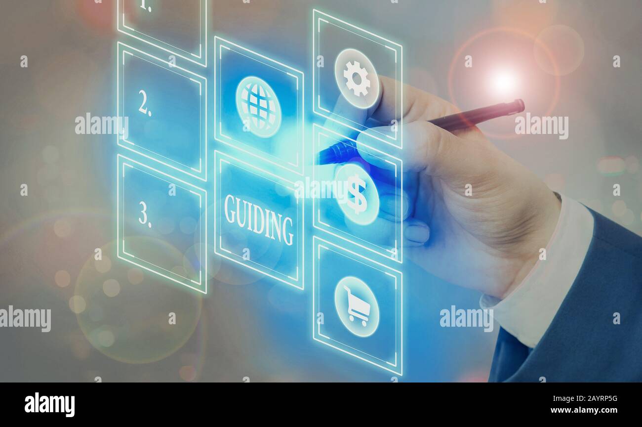 Text sign showing Guiding. Business photo showcasing to show someone ...