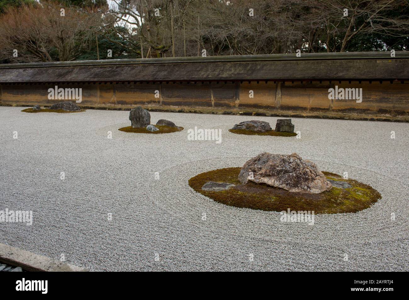 The kare-sansui (dry landscape) Zen rock garden at Ryoan-ji Temple in ...