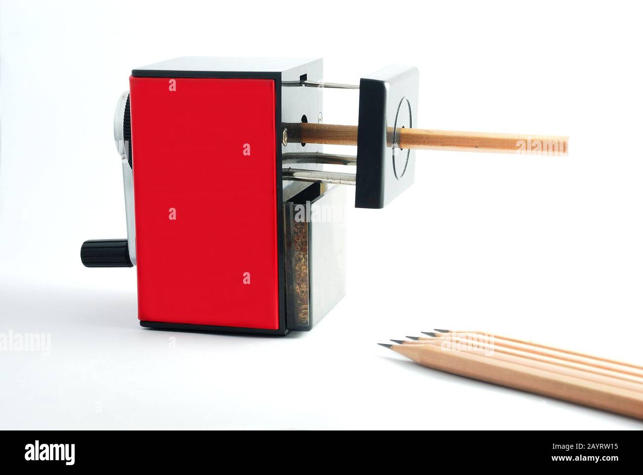 Rotary Pencil Sharpener. Red black rotary pencil sharpener with brown ...
