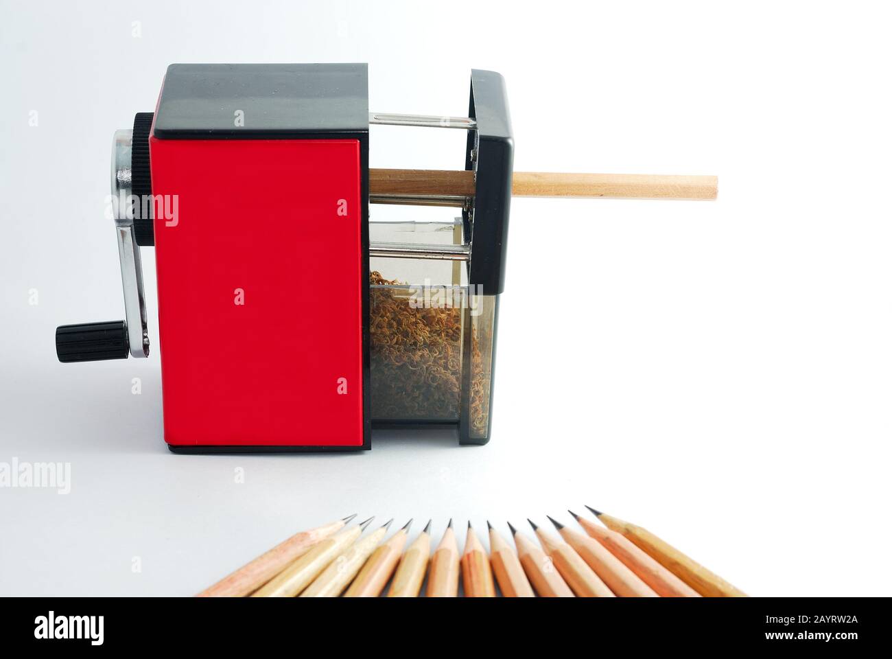 Pencil sharpener on white background. Red black rotary pencil sharpener ...