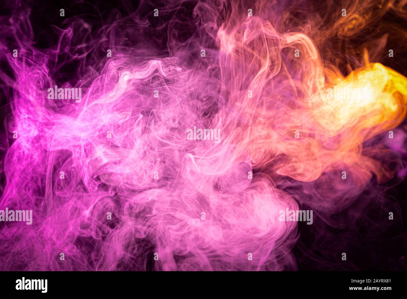 Colorful pink and red smoke on a black isolated background. Background ...