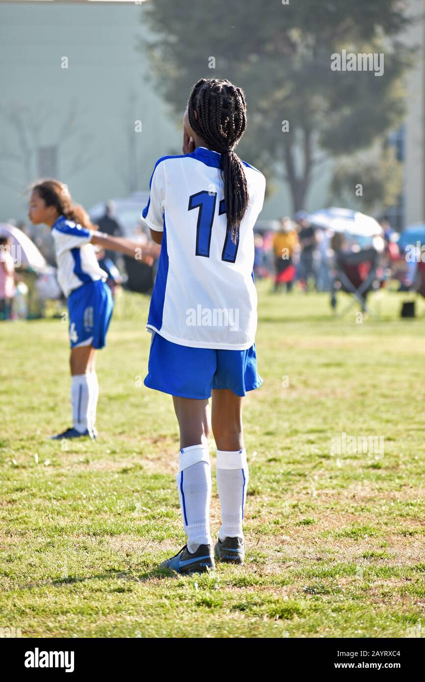Boys and girls team play soccer hi-res stock photography and images - Alamy