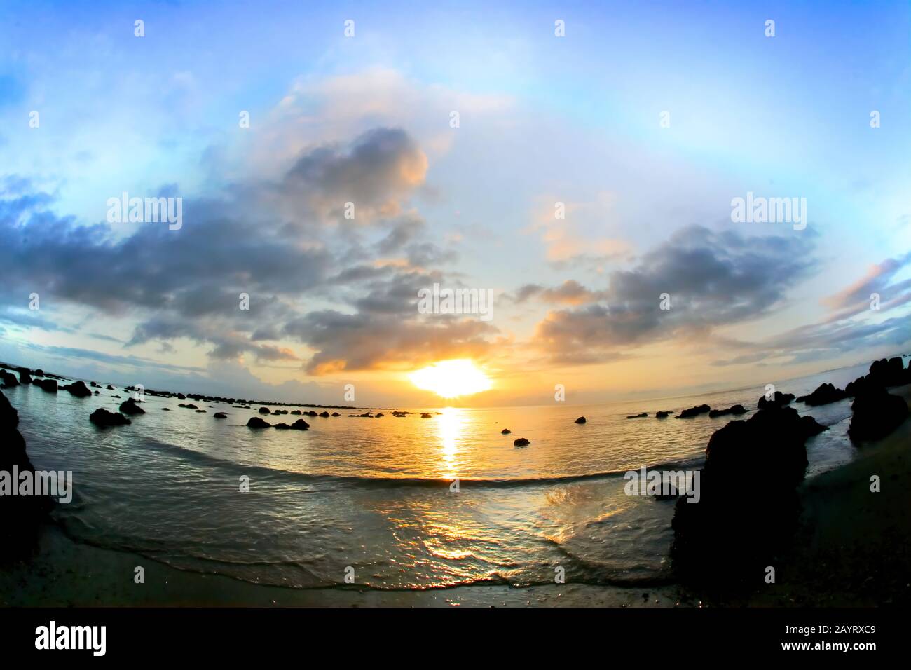 Sunrise at the coast: A beautiful sunrise at the beach, the horizon of ...