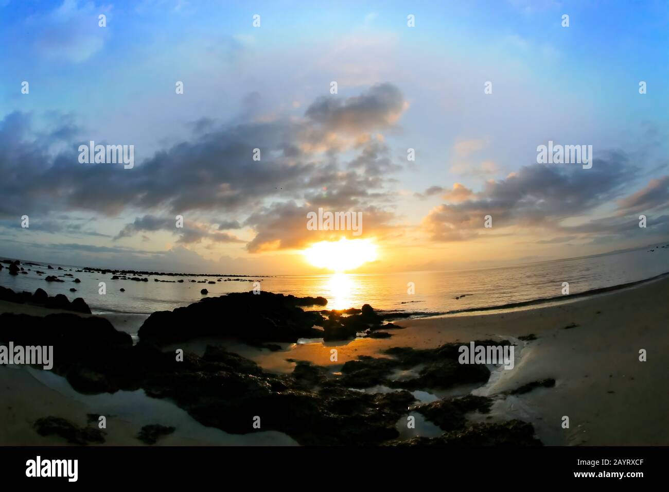 Sunrise at the coast: A beautiful sunrise at the beach, the horizon of ...