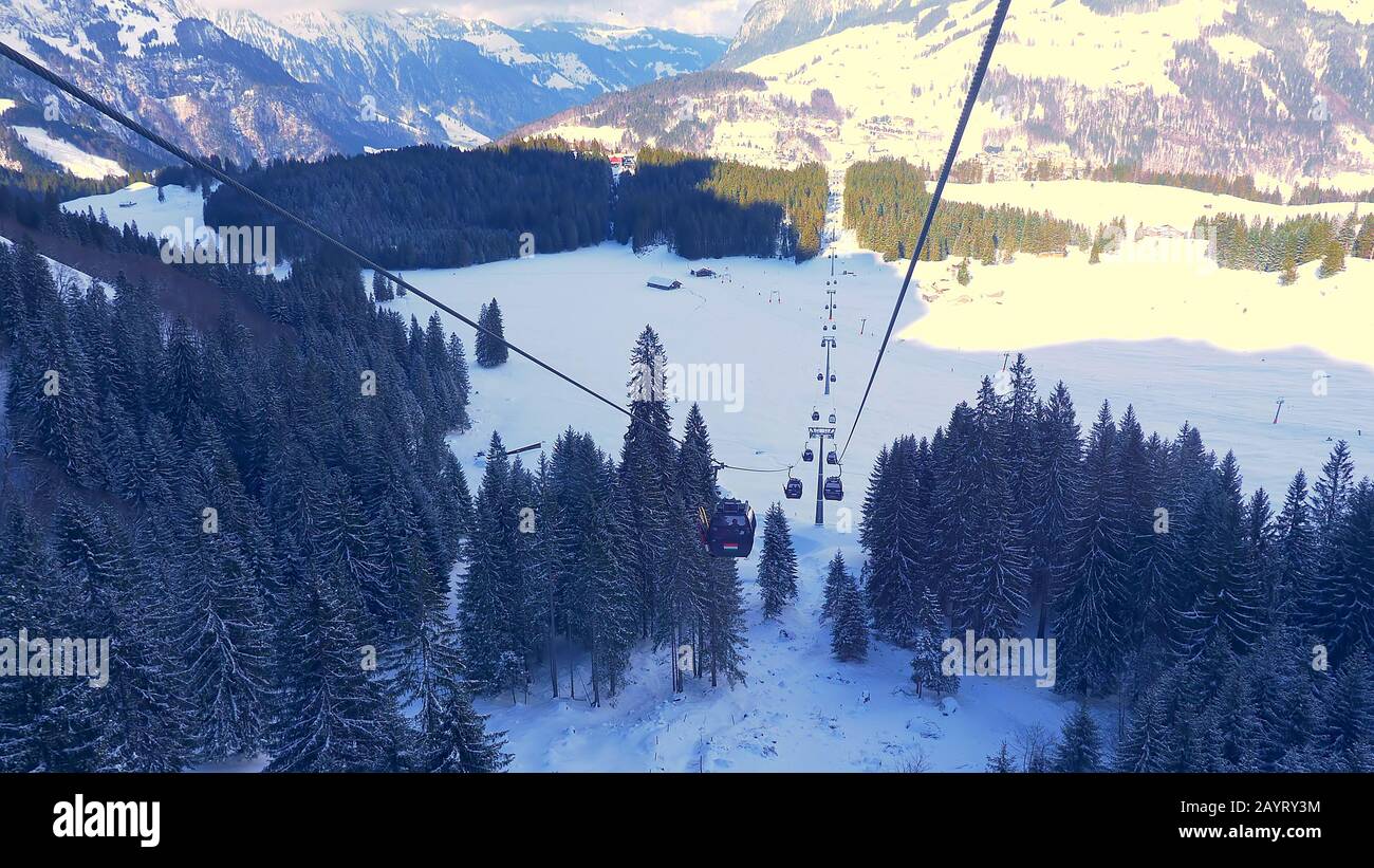 Ride in a cable car in the Alps on a winter's day Stock Photo - Alamy
