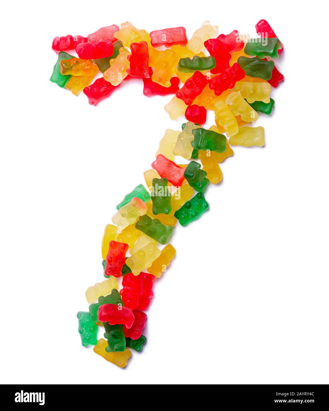 Arabic numeral "7" from multi-colored chewing marmalade on a white ...