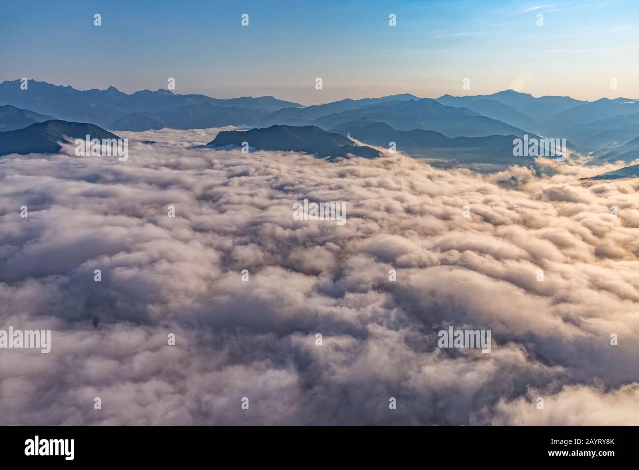 Mountain misty clouds aerial Stock Photo - Alamy