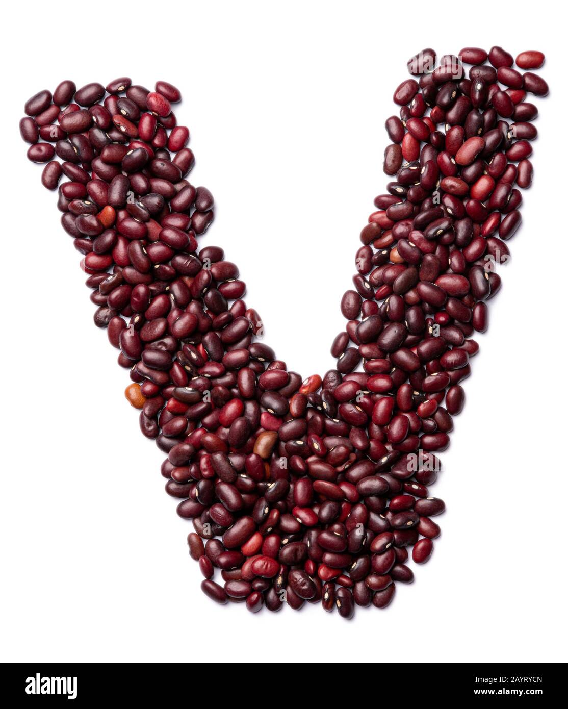 The letter "V" of the English alphabet from brown beans on a white ...