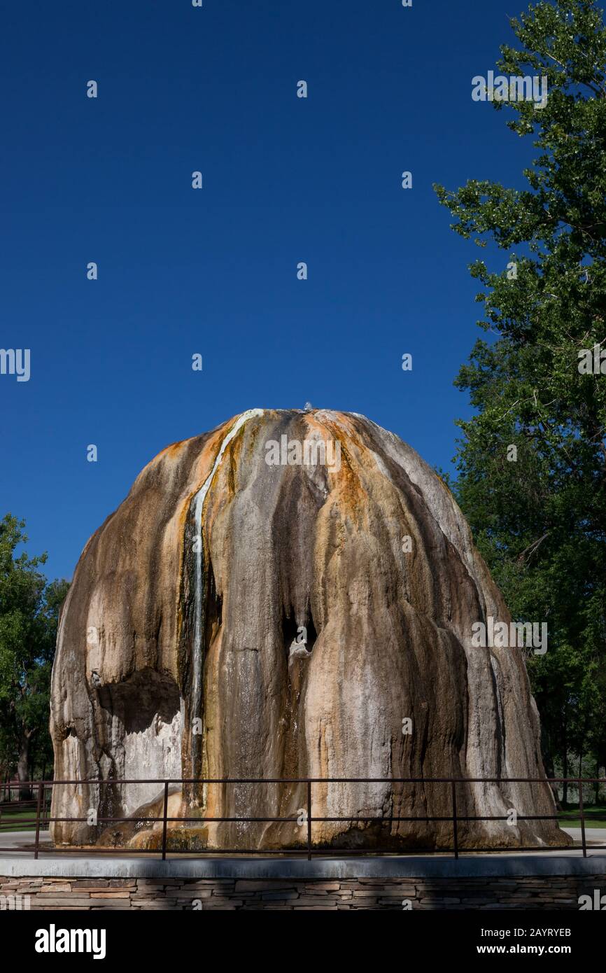 Hot mineral water flowing over a rock pyramid base for over a hundred ...