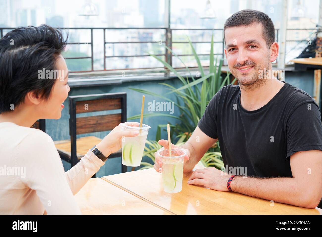 Asian man drinking cold coffee hi-res stock photography and images - Alamy